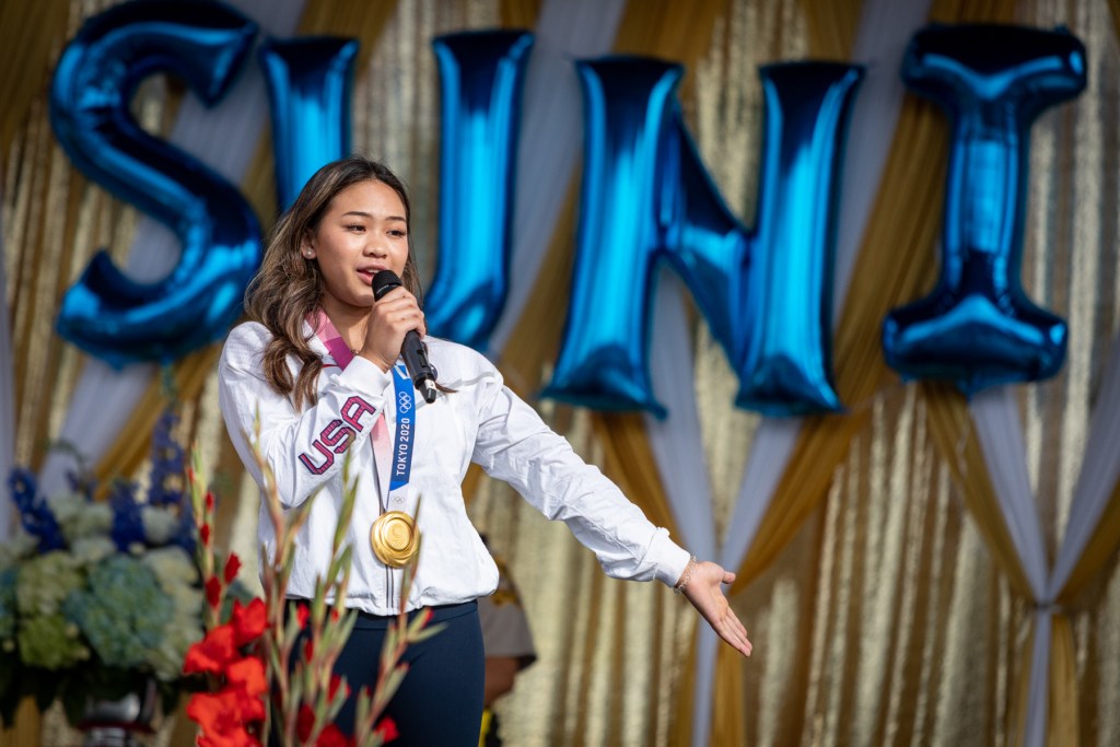 Parade celebrates triumph of Hmong American Olympian Sunisa Lee