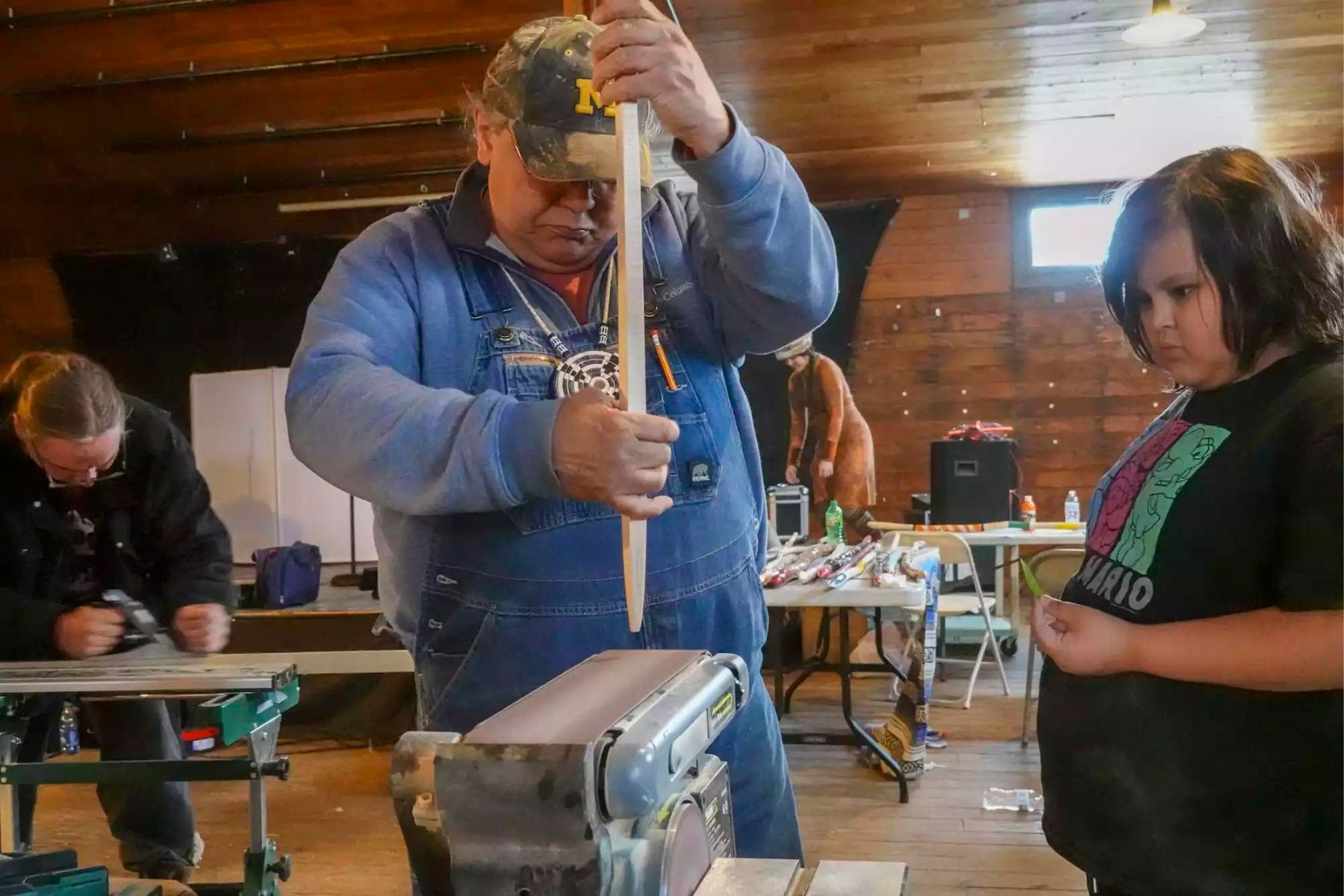 Elders teach the art of Snow Snake to a new generation