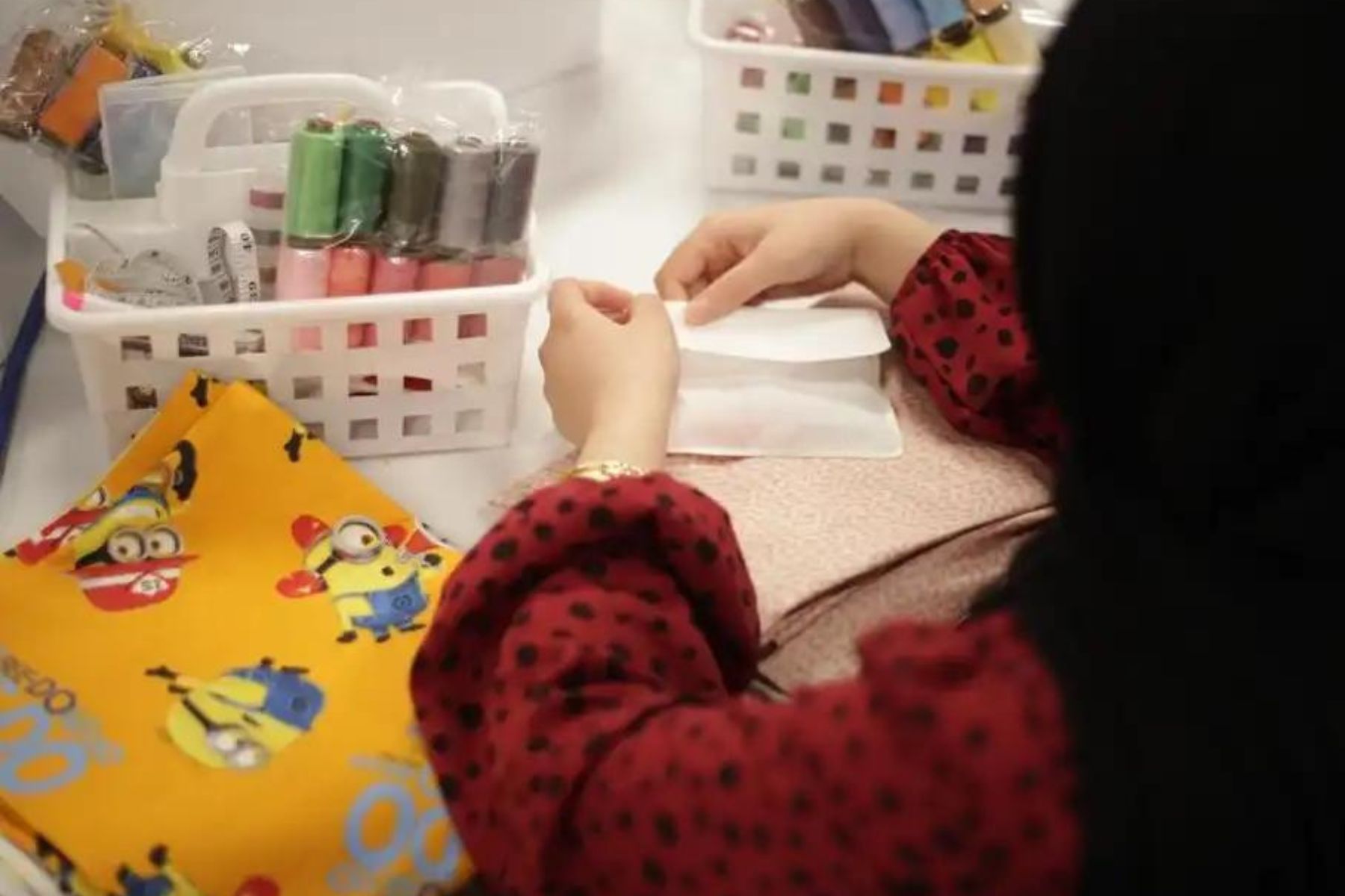 Minnesota's Afghan refugees building community through sewing